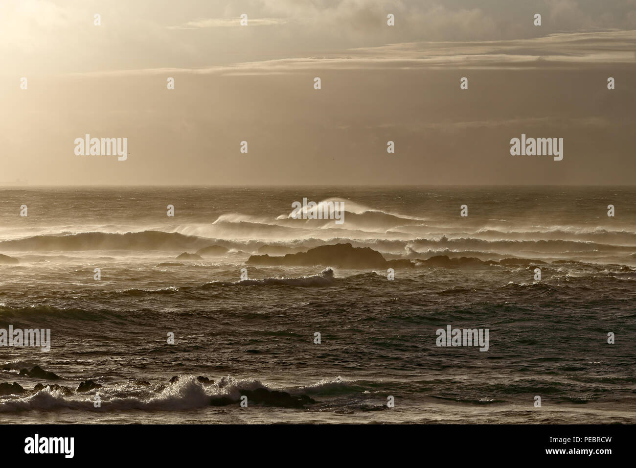 Windy Sunset on the Portuguese coast Stock Photo - Alamy
