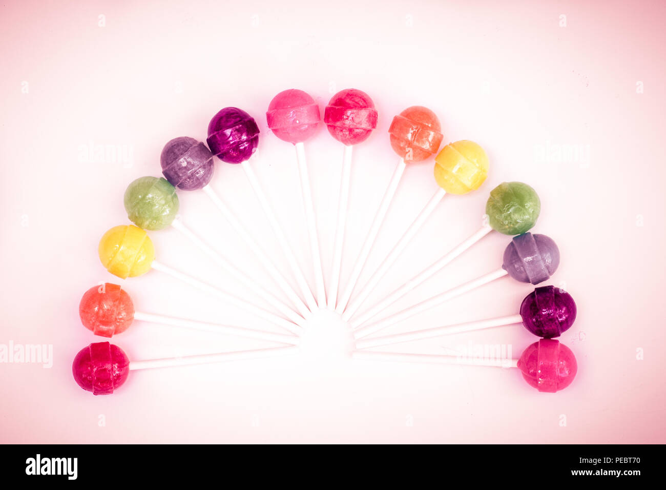 detailed image of colorful rainbow lollipops Stock Photo - Alamy