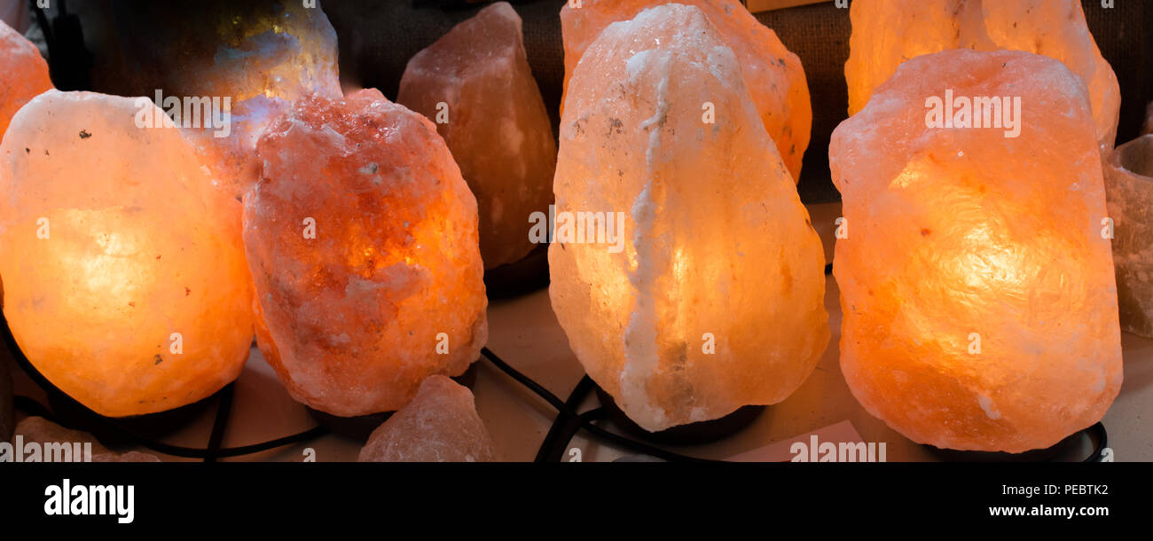 Himalayan salt lamp at the market ready to be sold Stock Photo - Alamy
