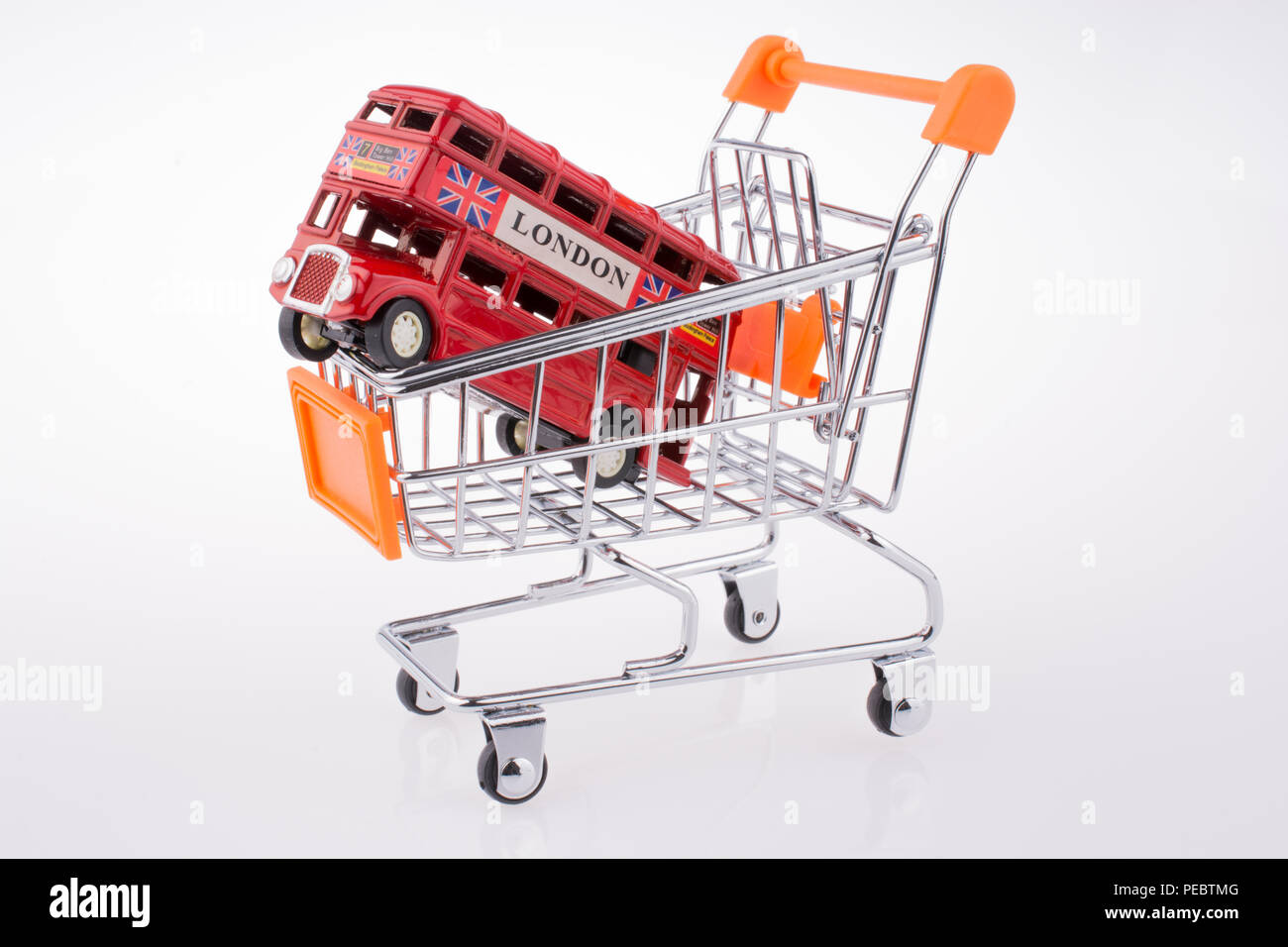 Model London Bus in a Shopping Cart Stock Photo - Alamy