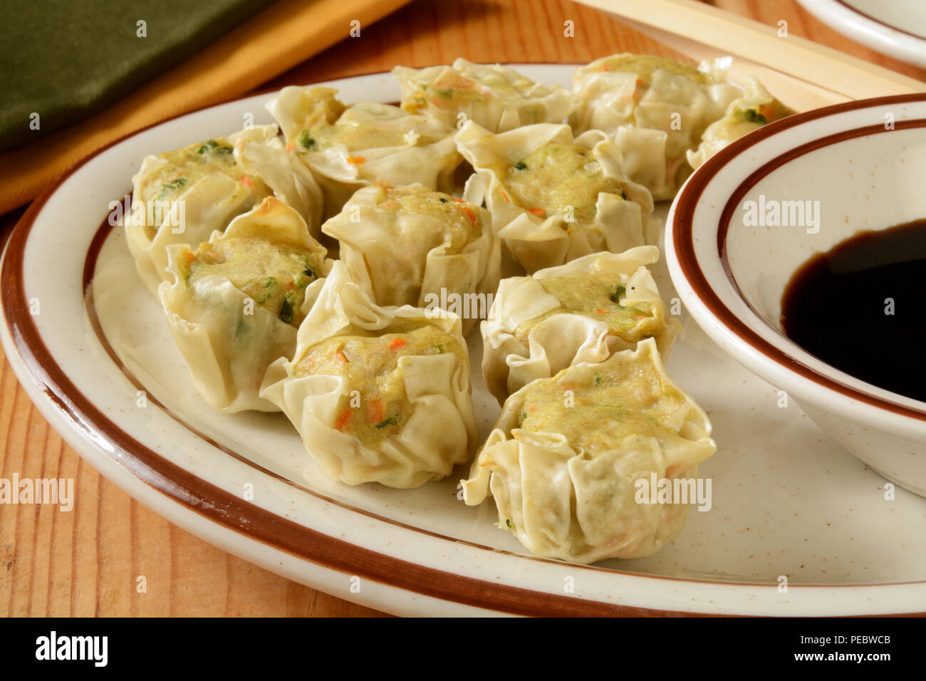 Chicken Shu mai with soy sauce and chop sticks Stock Photo - Alamy