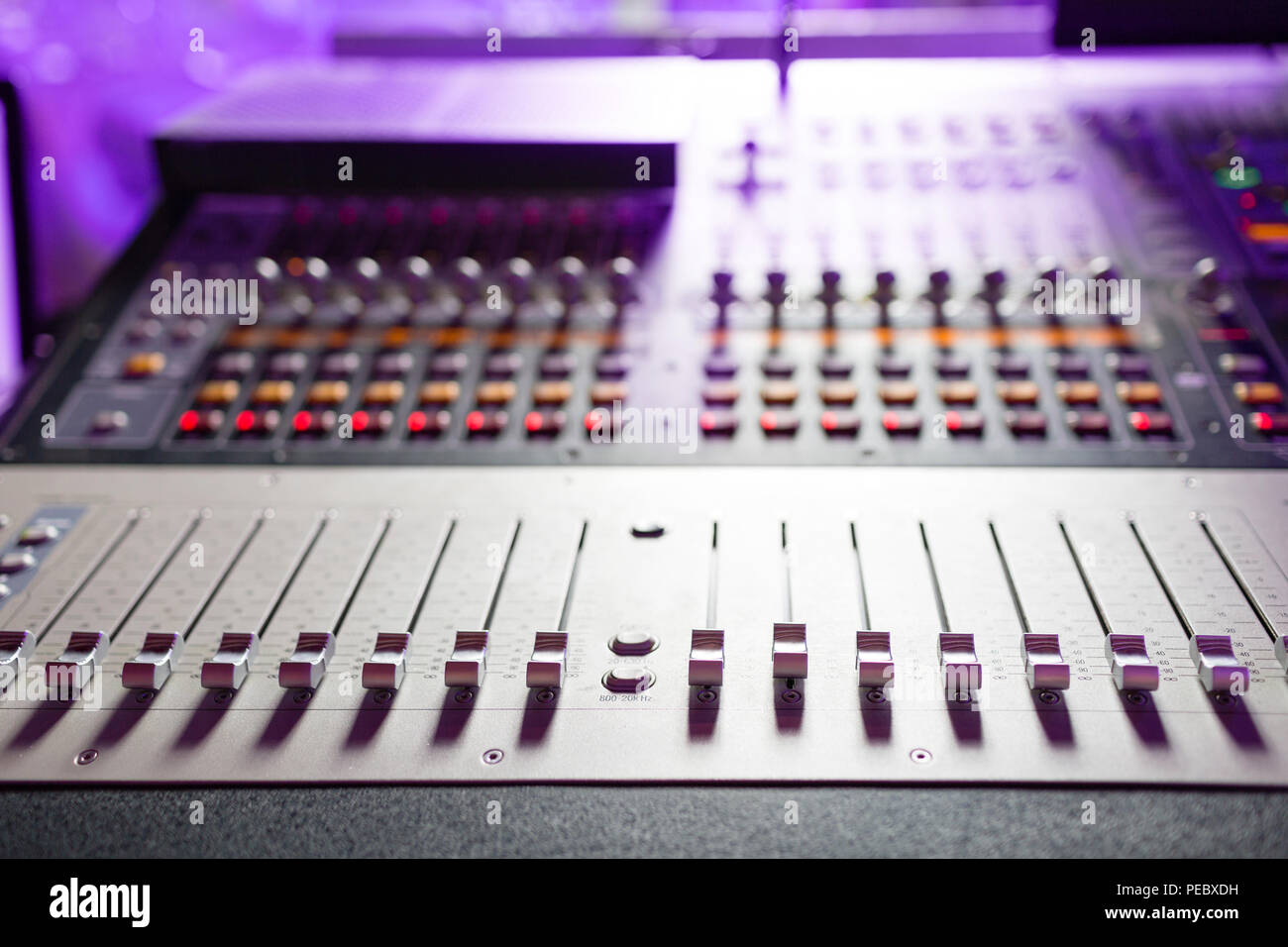 Sound mixer. Professional audio mixing console with lights, buttons ...