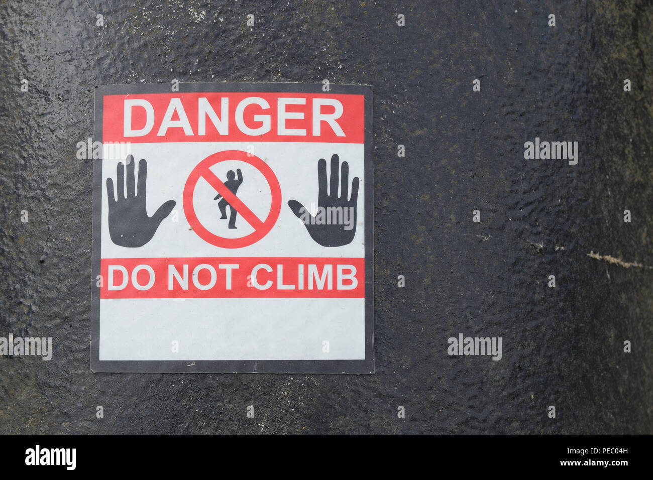 DANGER DO NOT CLIMB red and white warning sign with symbol of man ...