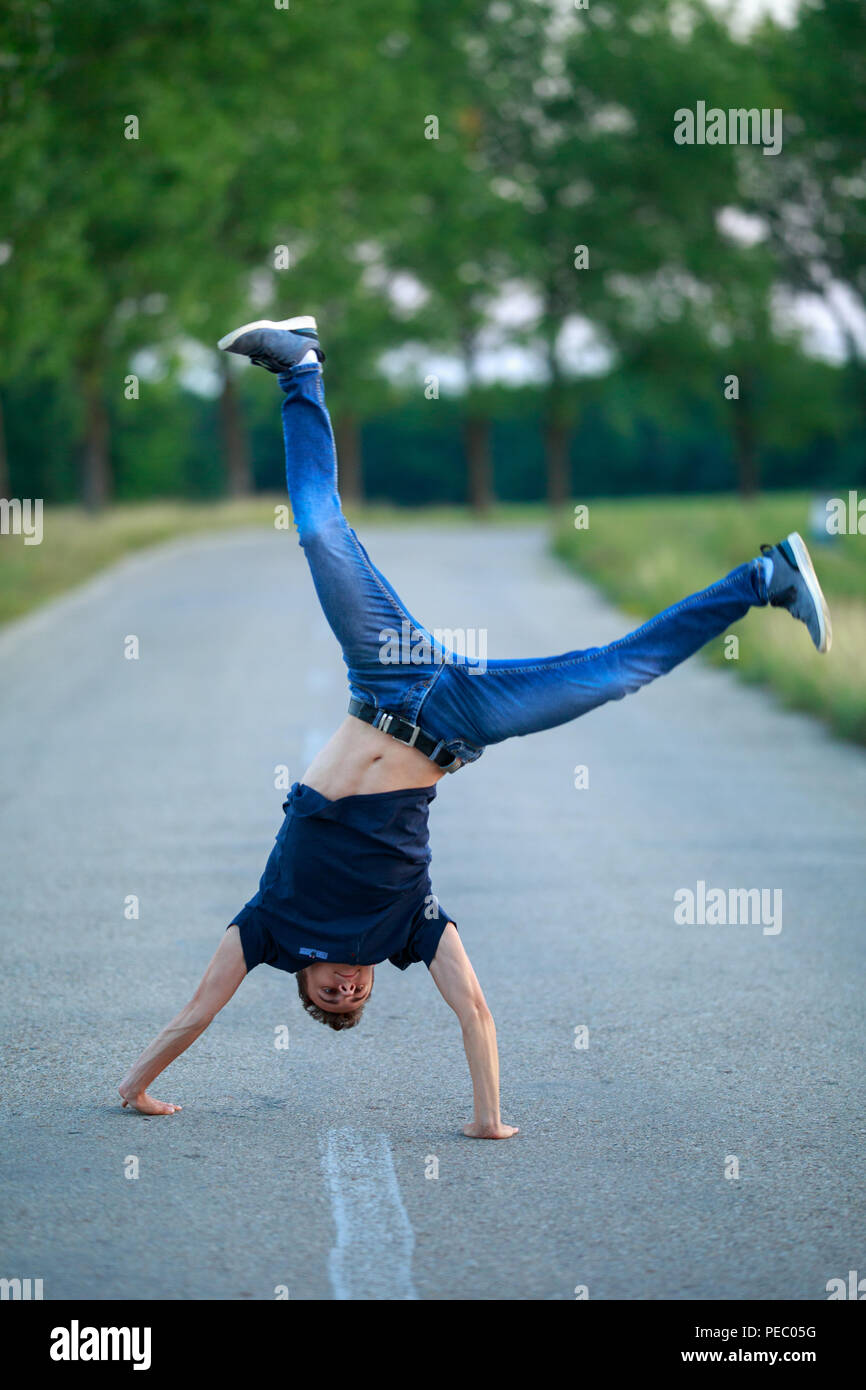 Walking handstand hi-res stock photography and images - Alamy