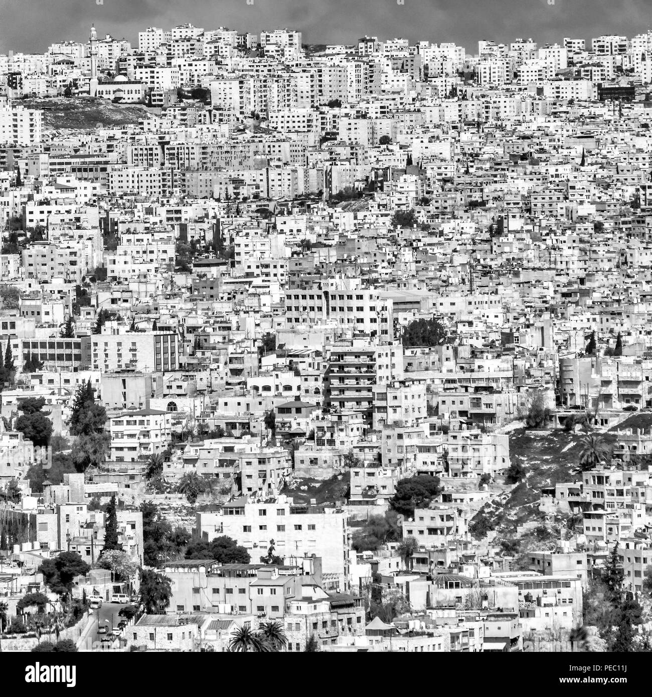 Black and white section of a view of Amman, the ugly overcrowded ...