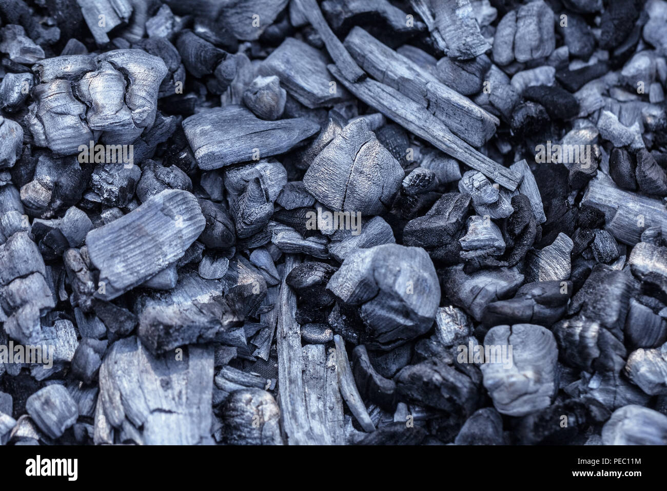 Black extinct embers of fire after holiday Stock Photo - Alamy
