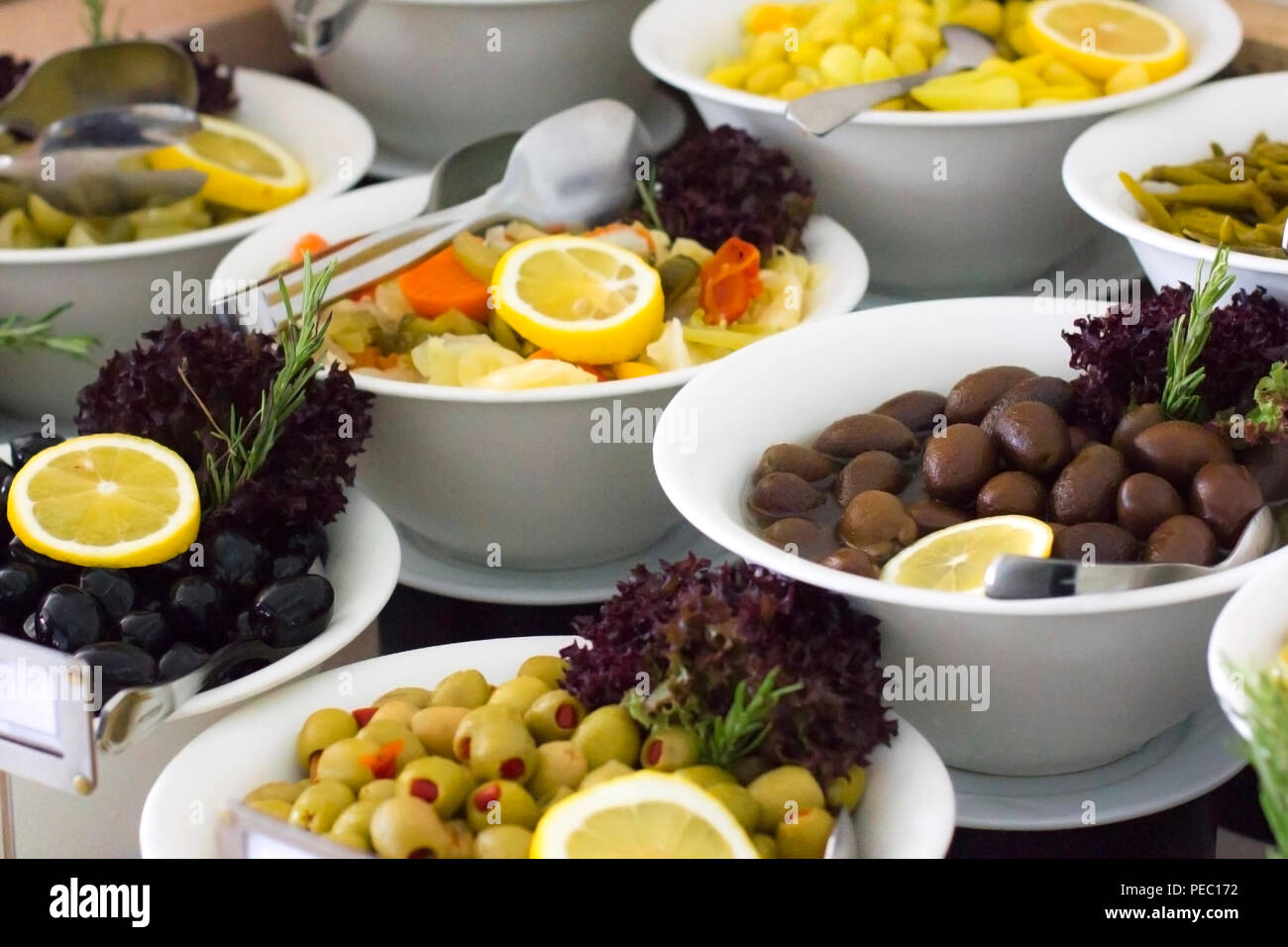 Variety of olives on the buffet at the hotel Stock Photo - Alamy