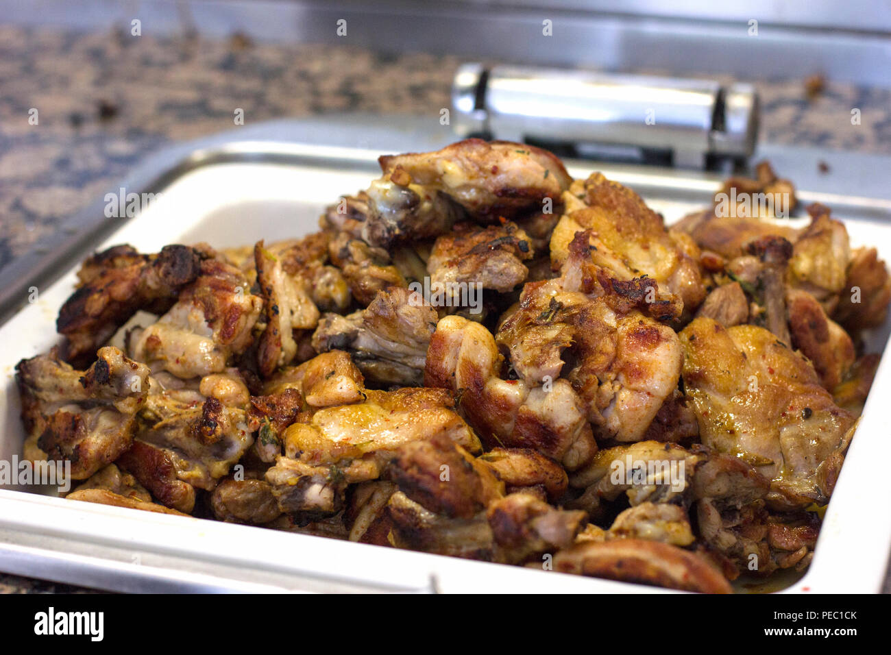 Chicken wings and ribs fried on grill Stock Photo - Alamy
