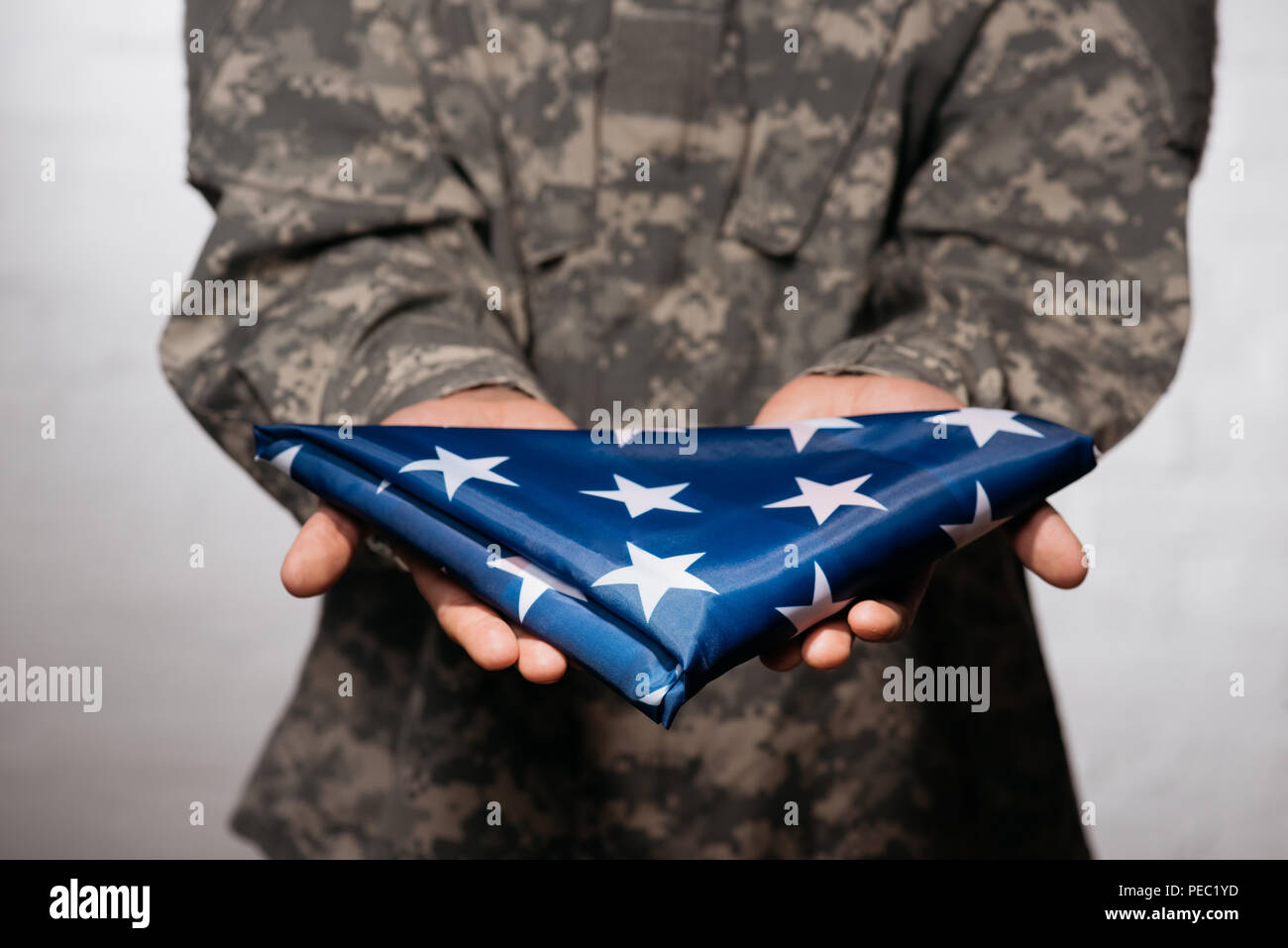 Folded flag hi-res stock photography and images - Alamy