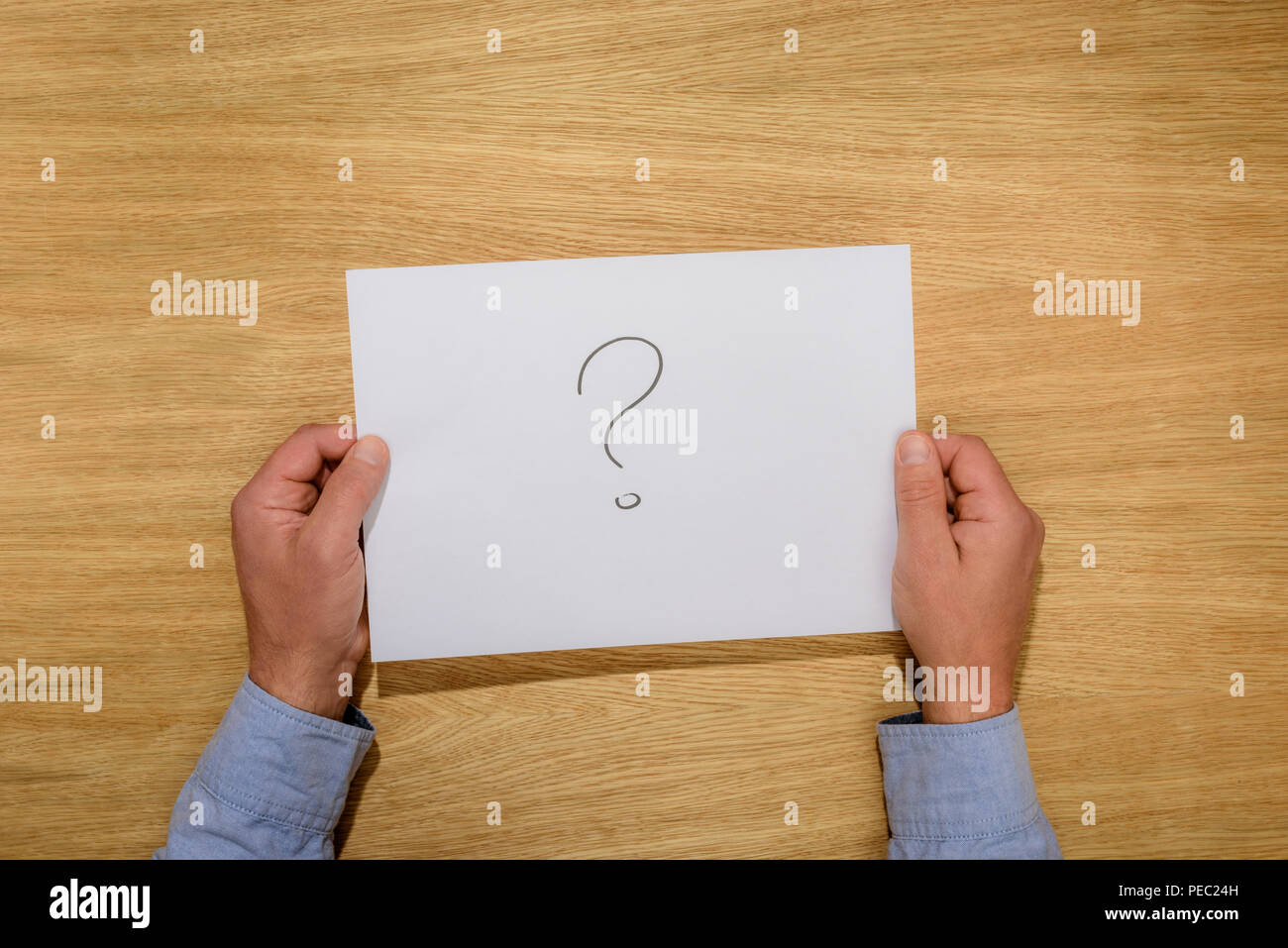 Hands holding sign question mark hi-res stock photography and images ...