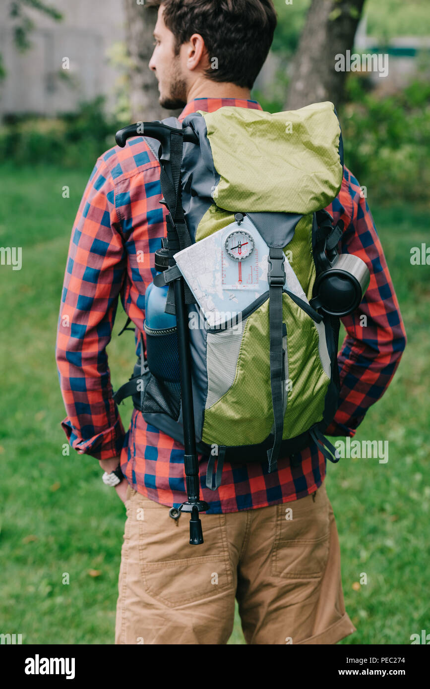 Traveler man backpack compass hi-res stock photography and images - Alamy