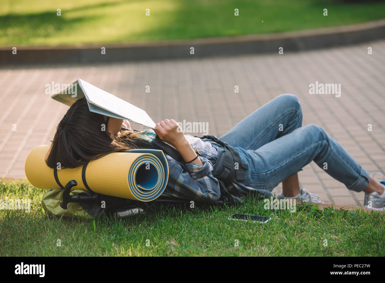 Girl Lying On Map High Resolution Stock Photography and Images - Alamy
