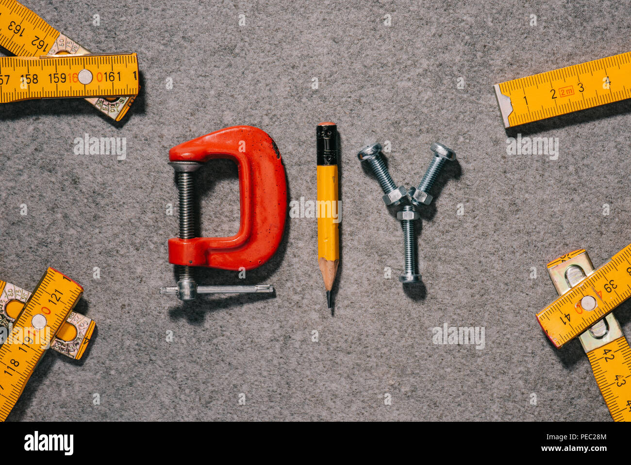 top view of word diy made of tools on grey surface Stock Photo - Alamy