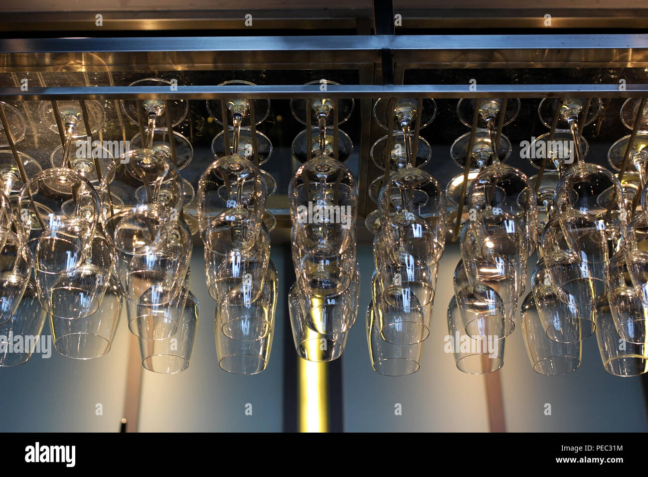 pile of empty transparent glasses on shelf Stock Photo - Alamy