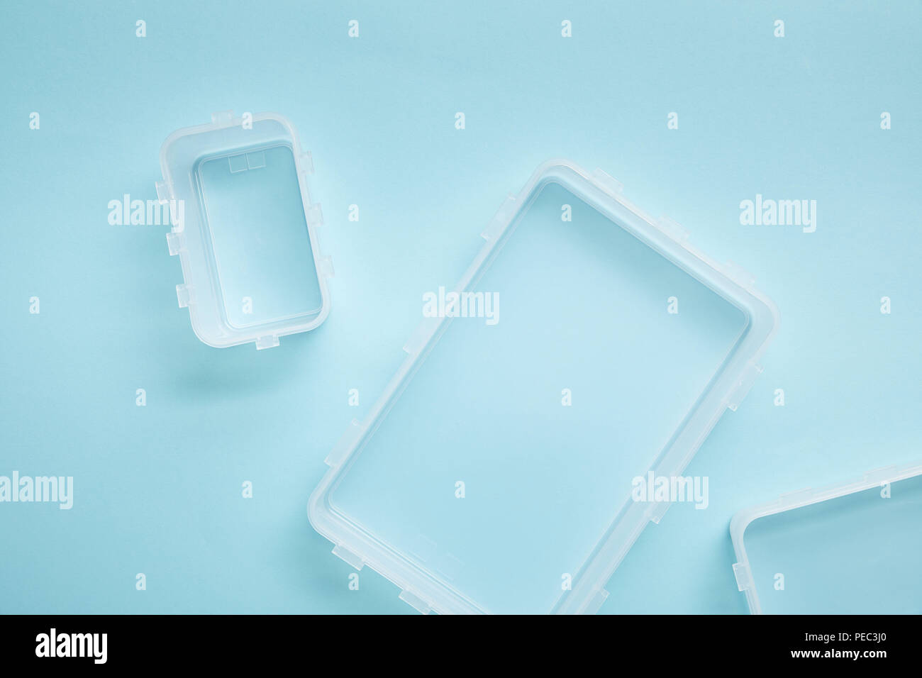 top view of empty lunch boxes isolated on blue Stock Photo - Alamy