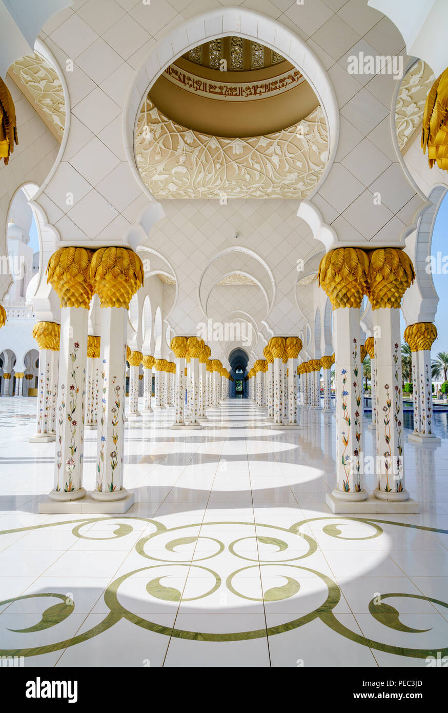 A colonnade in Sheikh Zayed Grand Mosque in Abu Dhabi, UAE Stock Photo ...