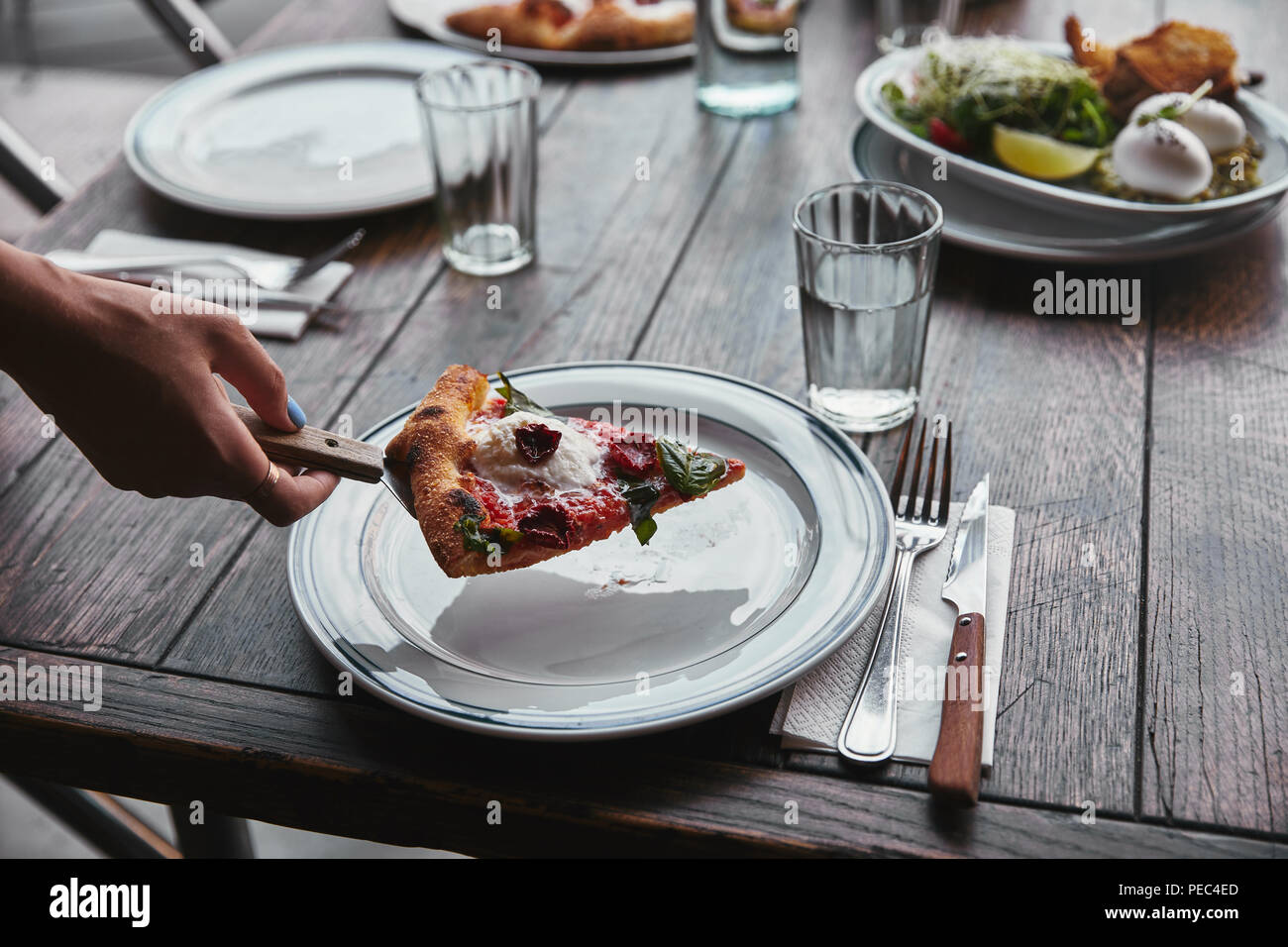 Pizza serving server table hi-res stock photography and images - Alamy