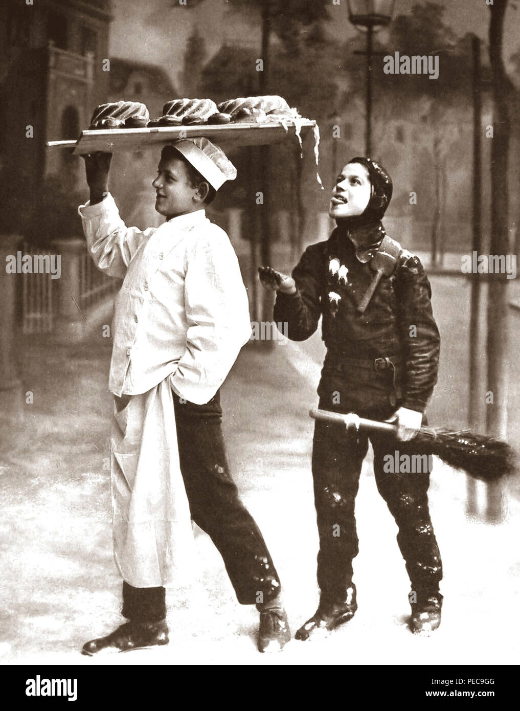 Baker with chimney sweep nibbling cake, 1920s, Germany Stock Photo - Alamy