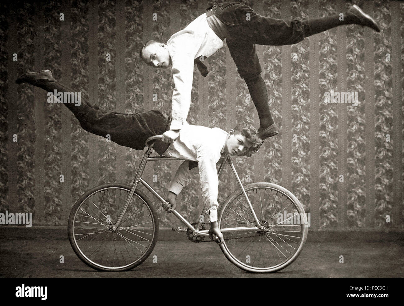Acrobats bicycle hi-res stock photography and images - Alamy