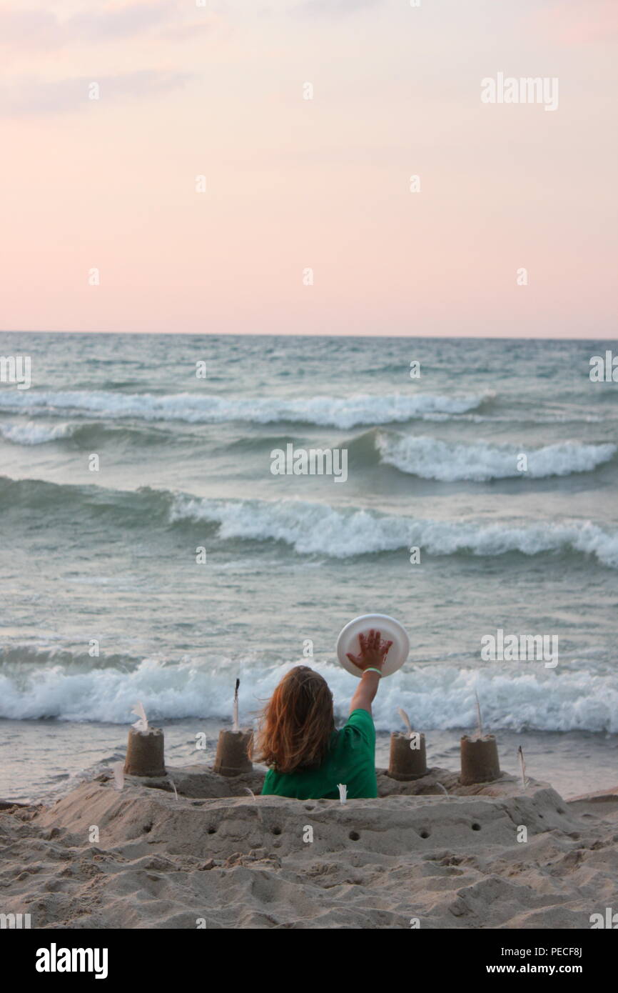 Girl Holding Her Hair In Wind High Resolution Stock Photography and ...