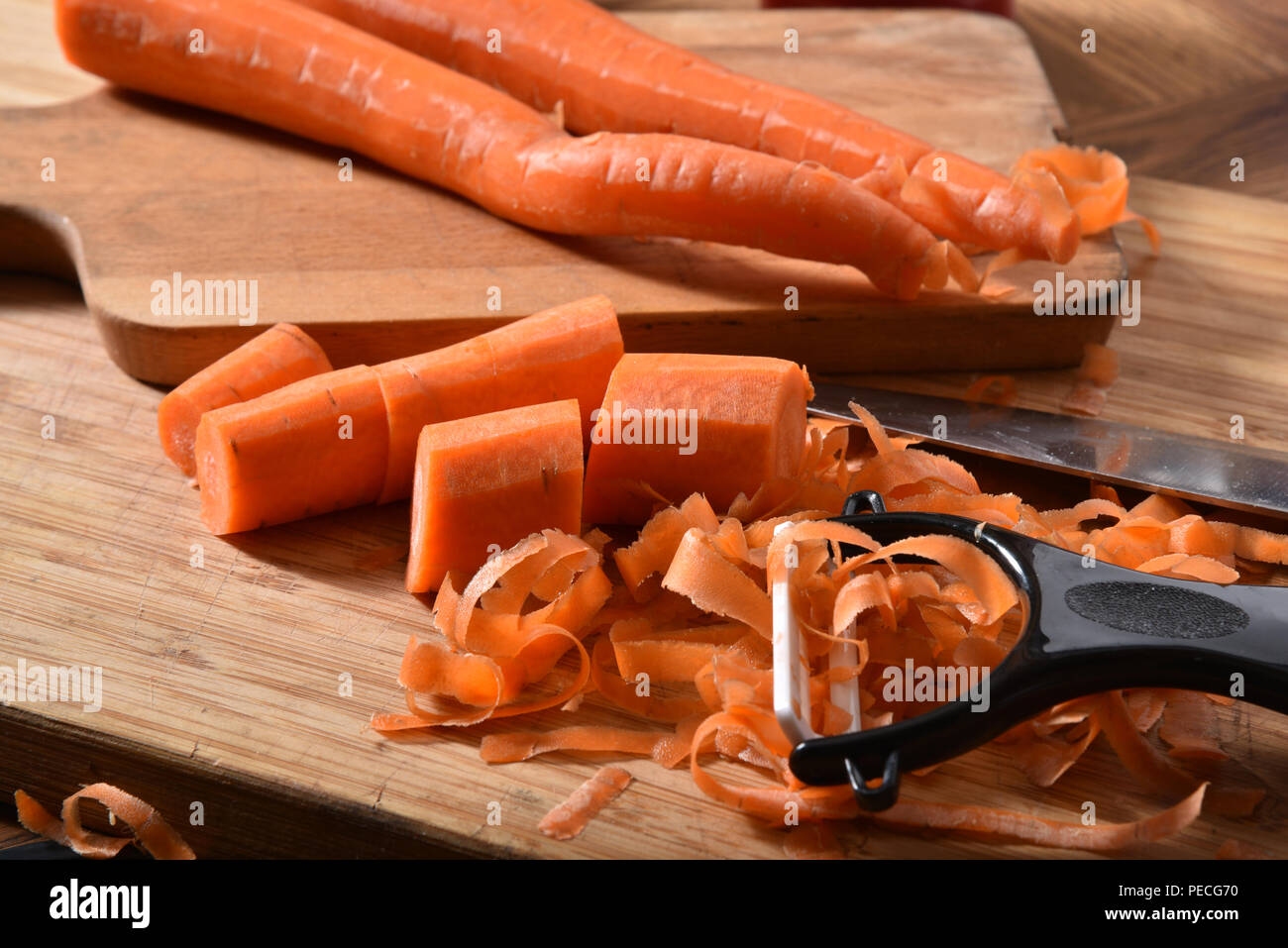 Peeled and diced carrots on a cutting board Stock Photo - Alamy
