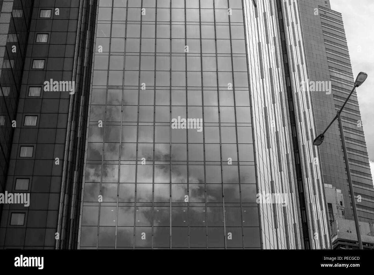 windows of commercial building in Hong Kong with B&W color Stock Photo ...