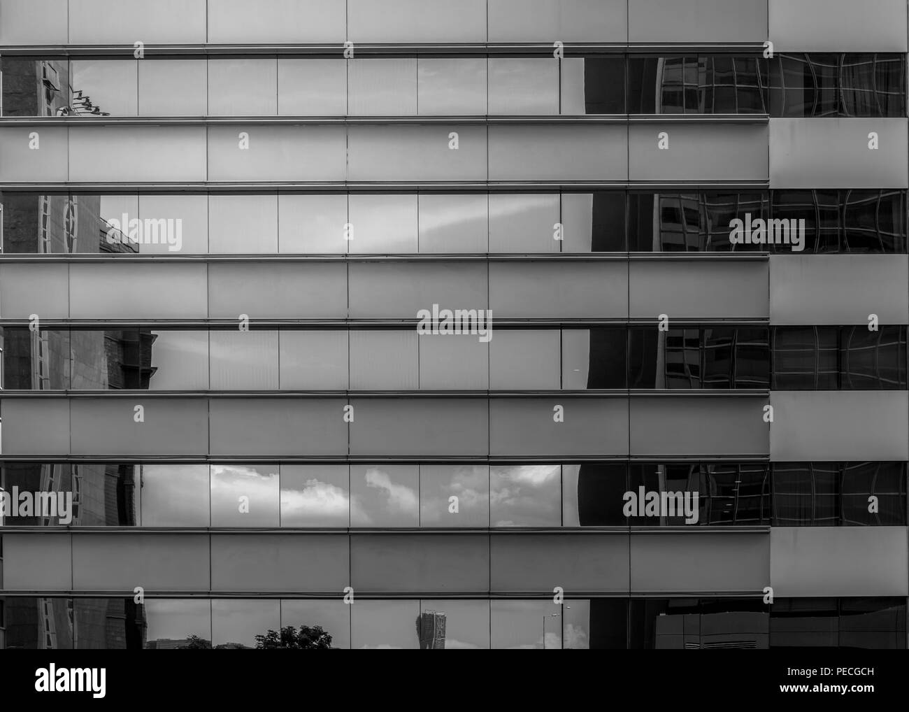 windows of commercial building in Hong Kong with B&W color Stock Photo ...