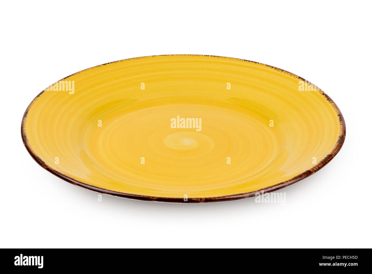 Yellow orange plate Cut Out Stock Images & Pictures - Alamy