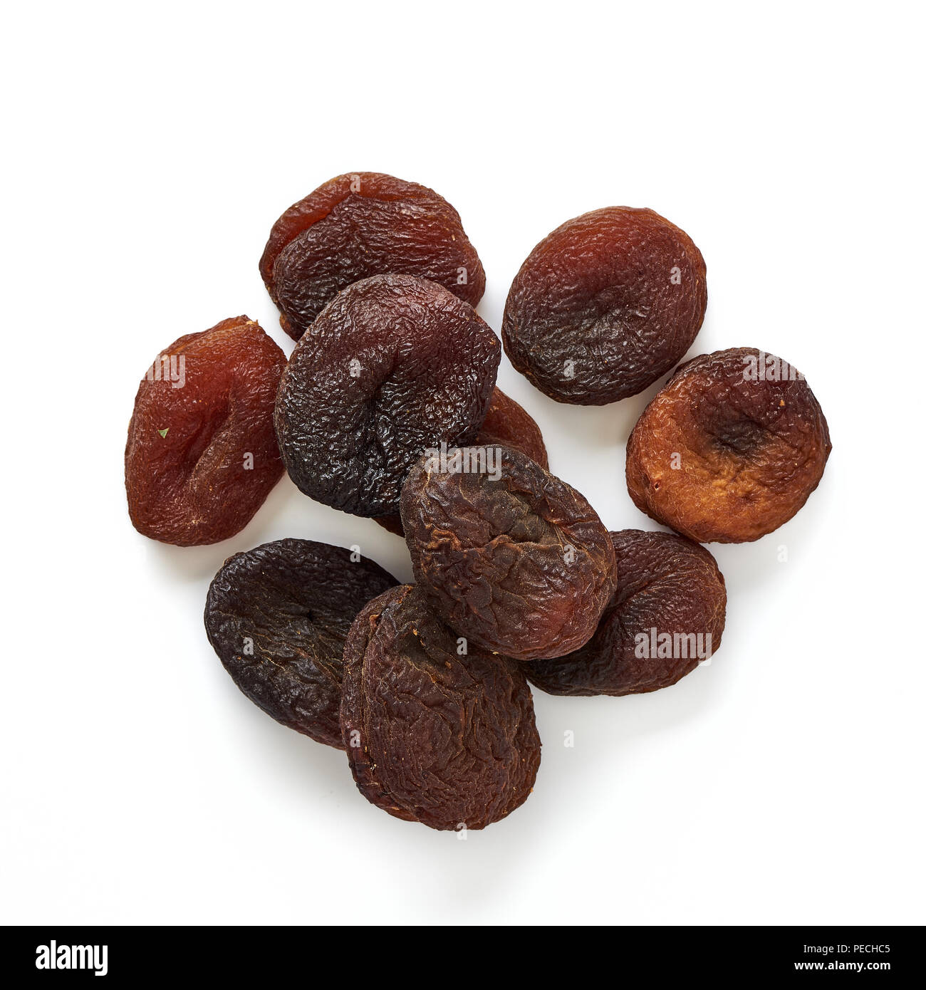 Sun dried apricots isolated on white background. Top view Stock Photo ...