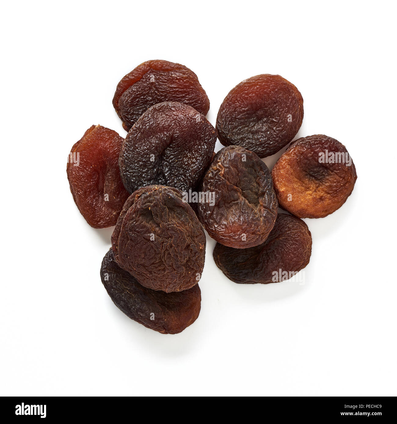 Sun dried apricots isolated on white background. Top view Stock Photo ...