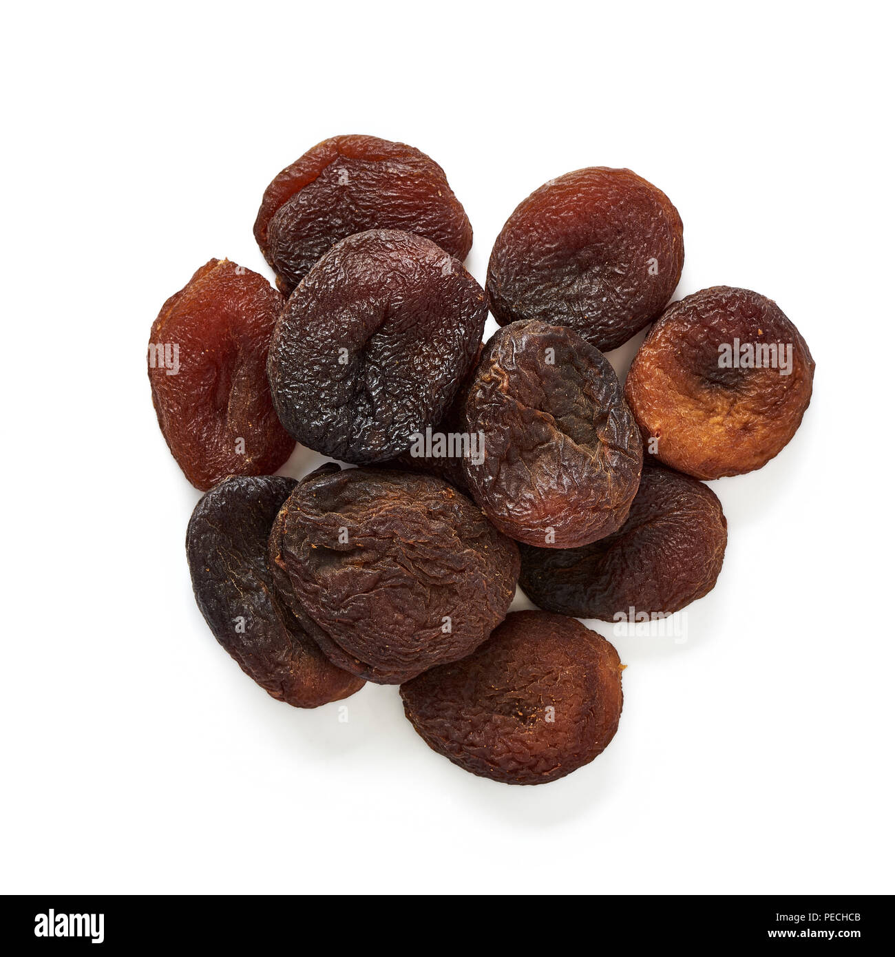 Sun dried apricots isolated on white background. Top view Stock Photo ...