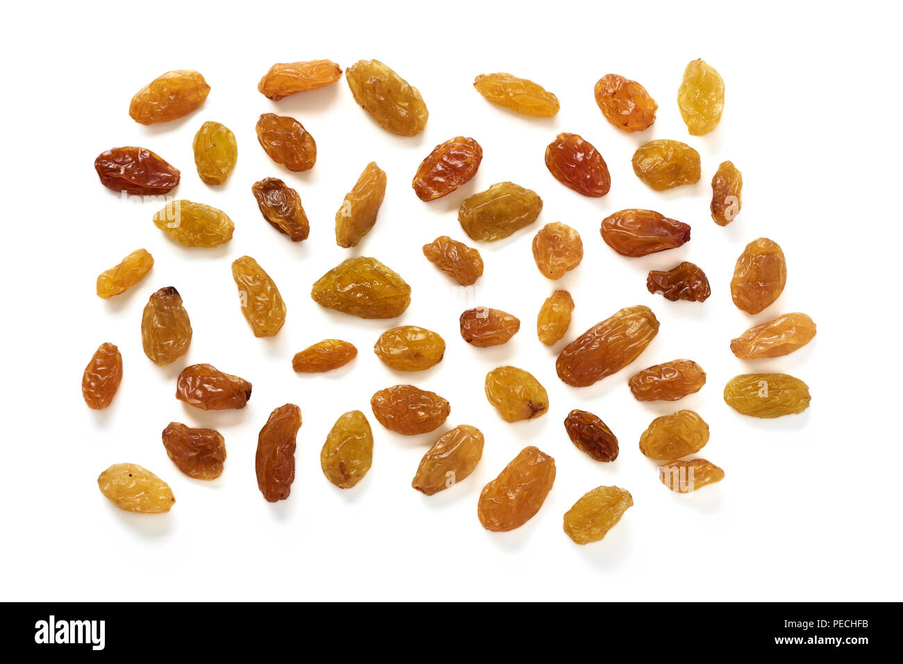 Yellow raisins isolated on white background. Top view Stock Photo - Alamy