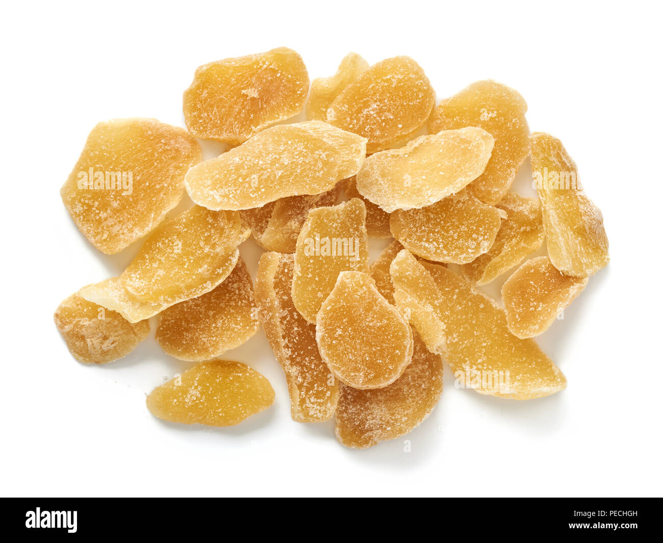 Dried sweet ginger with sugar isolated on a white background. Top view ...