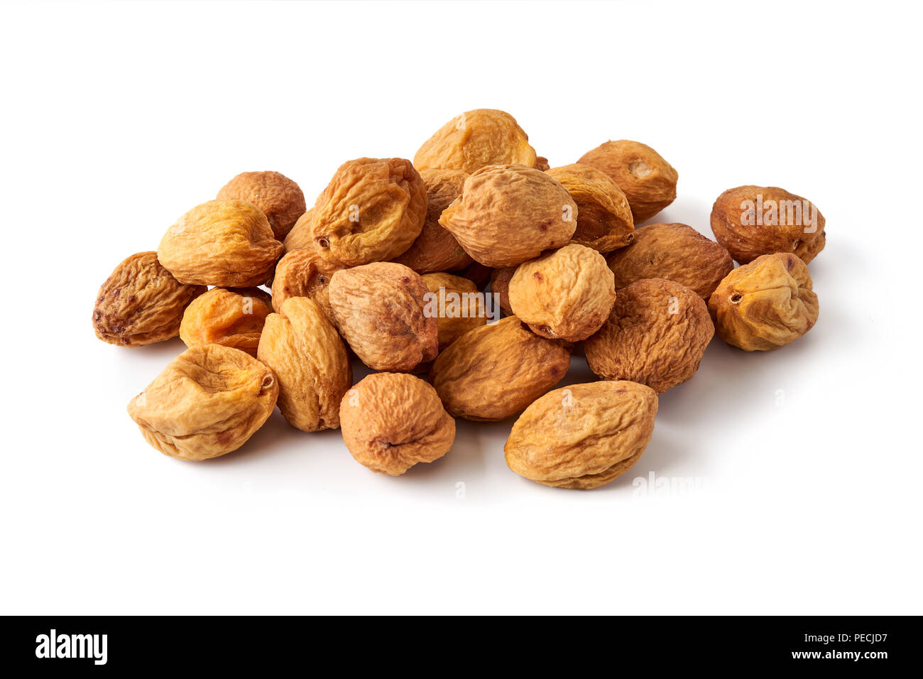 Sun dried apricots isolated on white background Stock Photo - Alamy