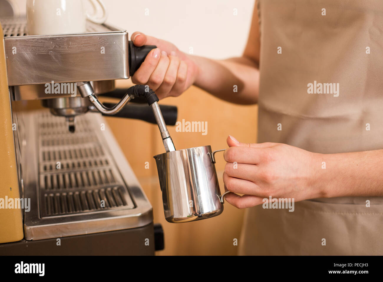 Coffee preparation. Close up of a cup being used for preparation of ...