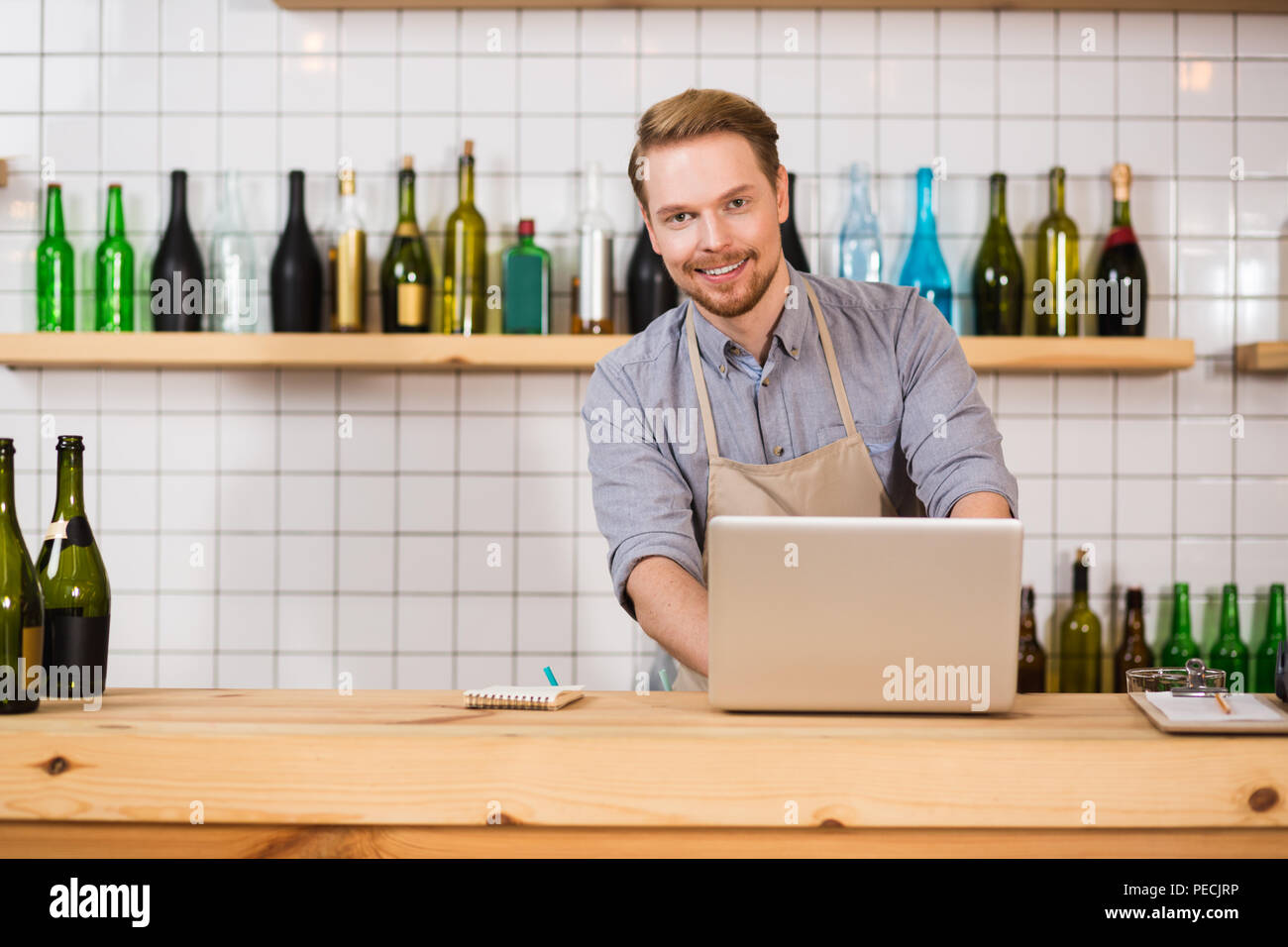 Employee worker counter taking order hi-res stock photography and ...