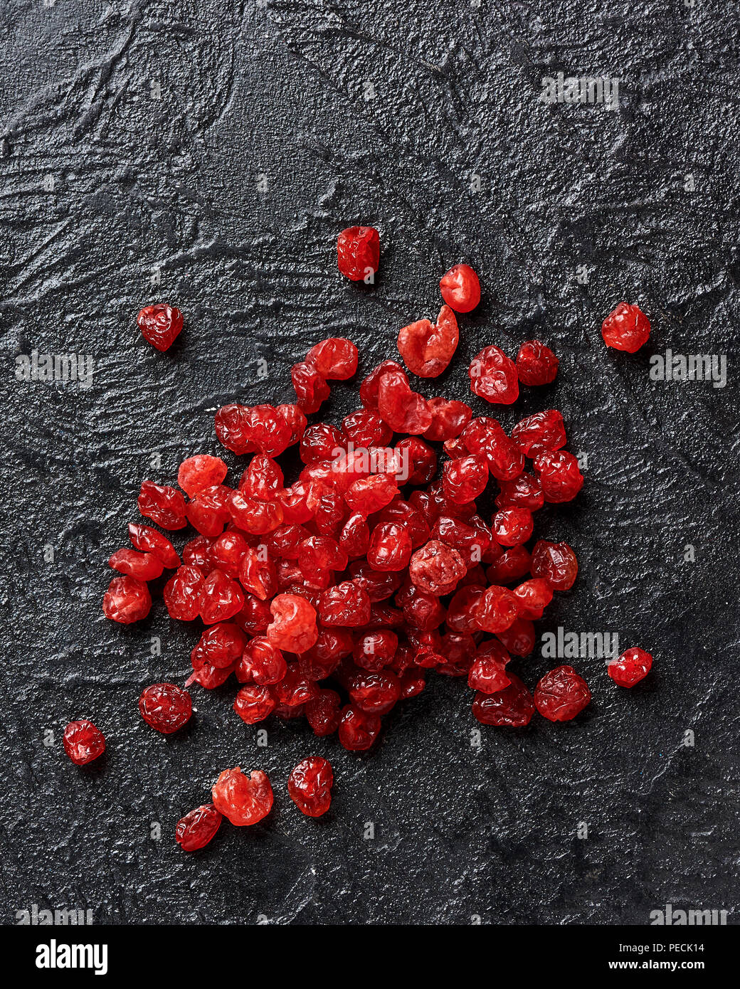 Dried red cherries on a black background with copy space Stock Photo ...