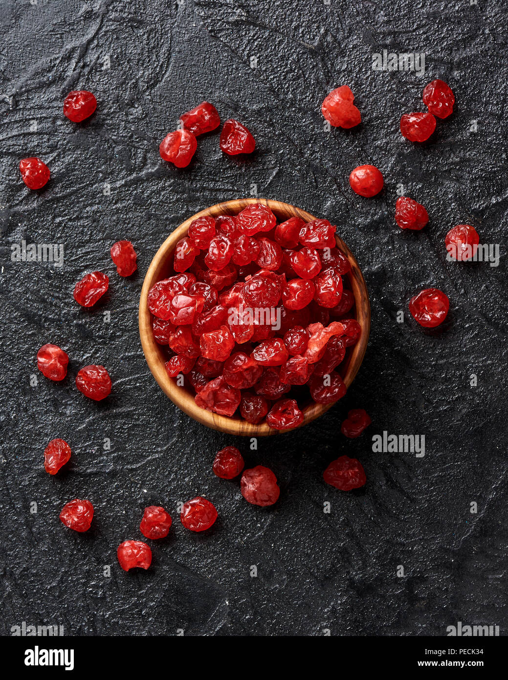 Dried red cherries on a black background with copy space Stock Photo ...