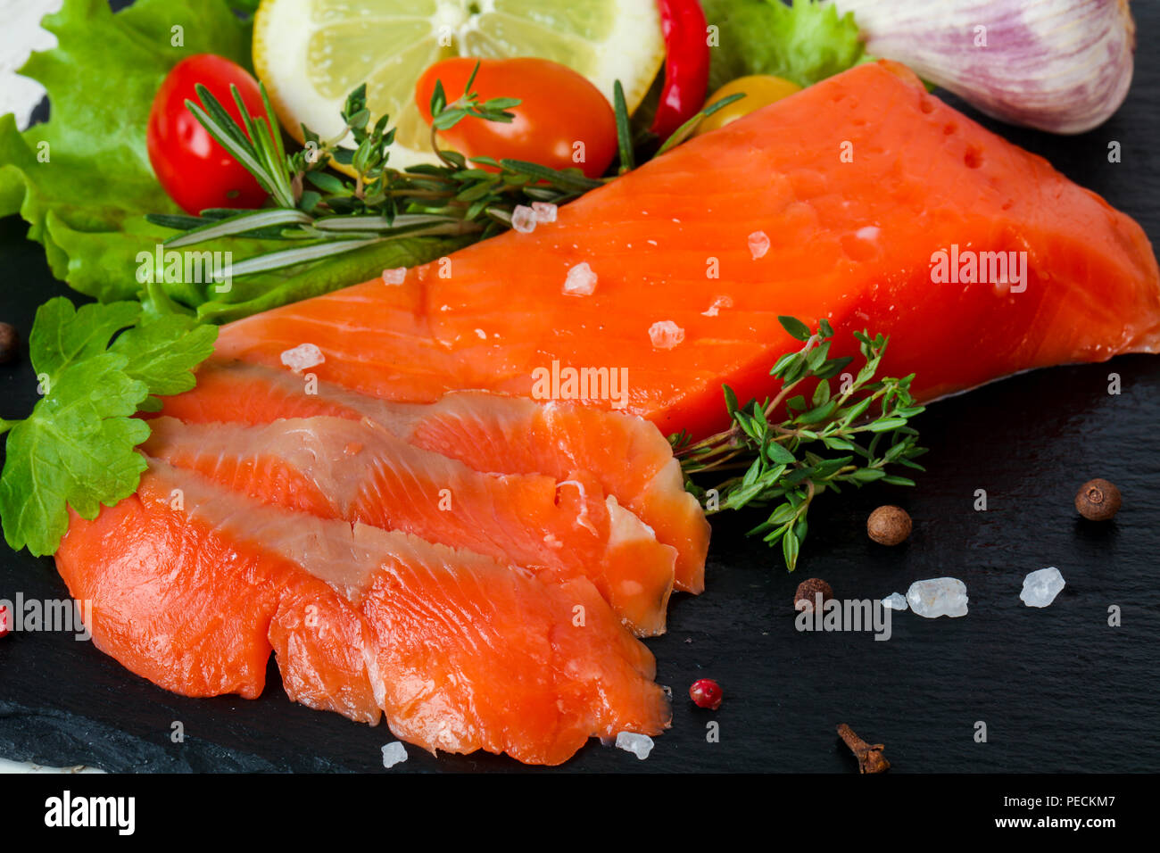Raw trout fillet with salt and spices Stock Photo - Alamy