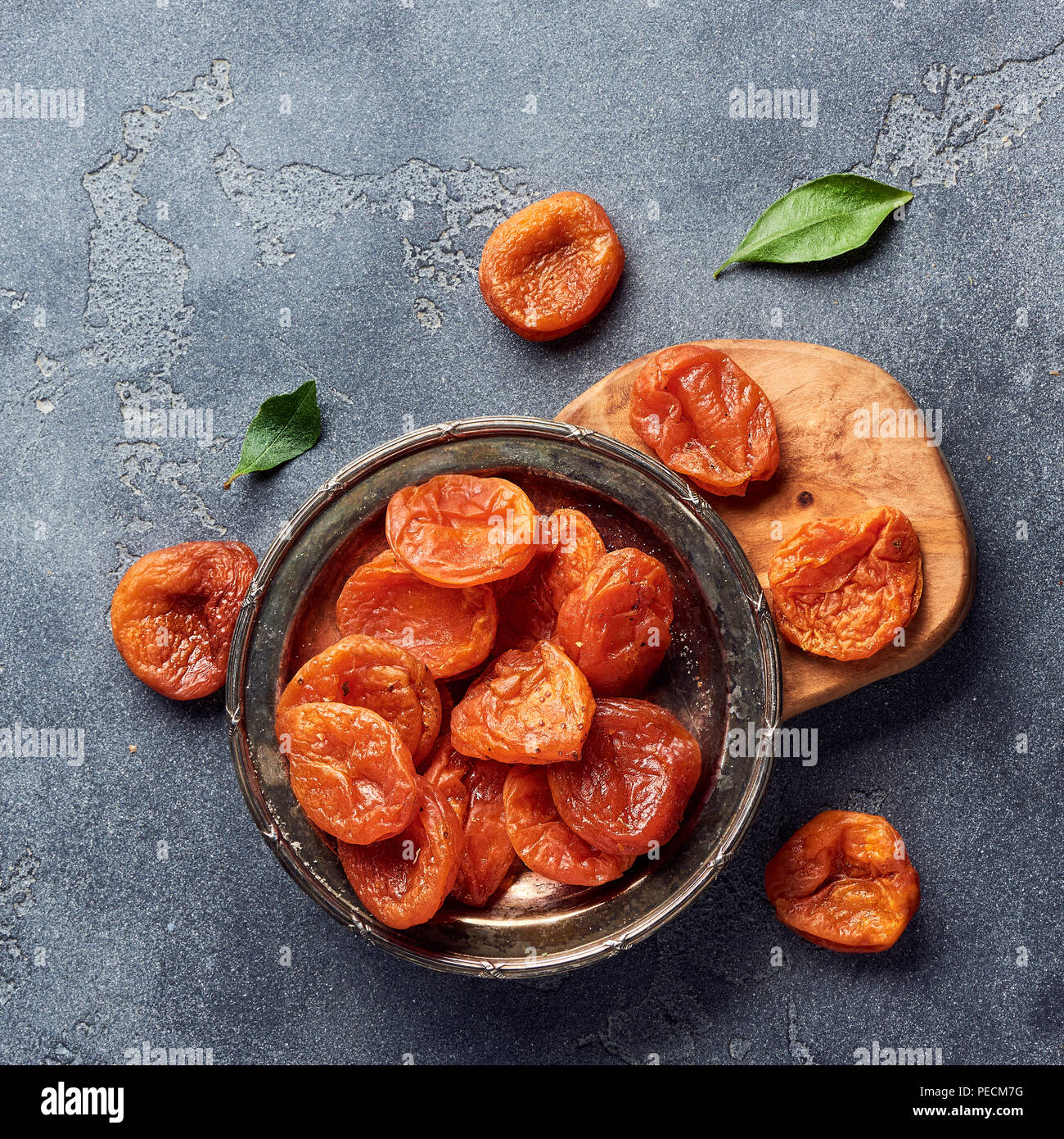 Dried apricots on gray background with copy space. Top view Stock Photo ...