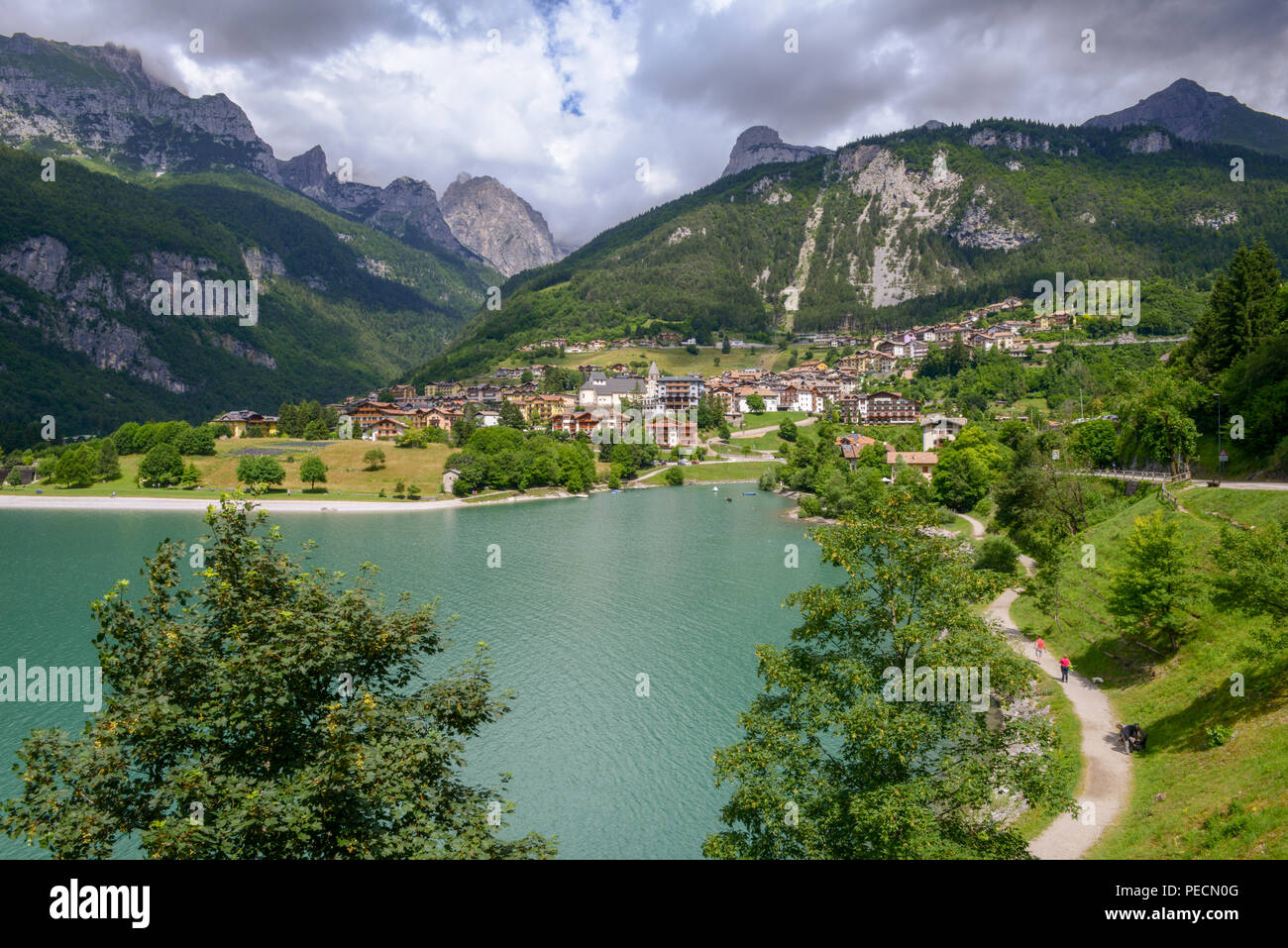 Village and lake Molveno at the foot of the Brenta Dolomites in western ...
