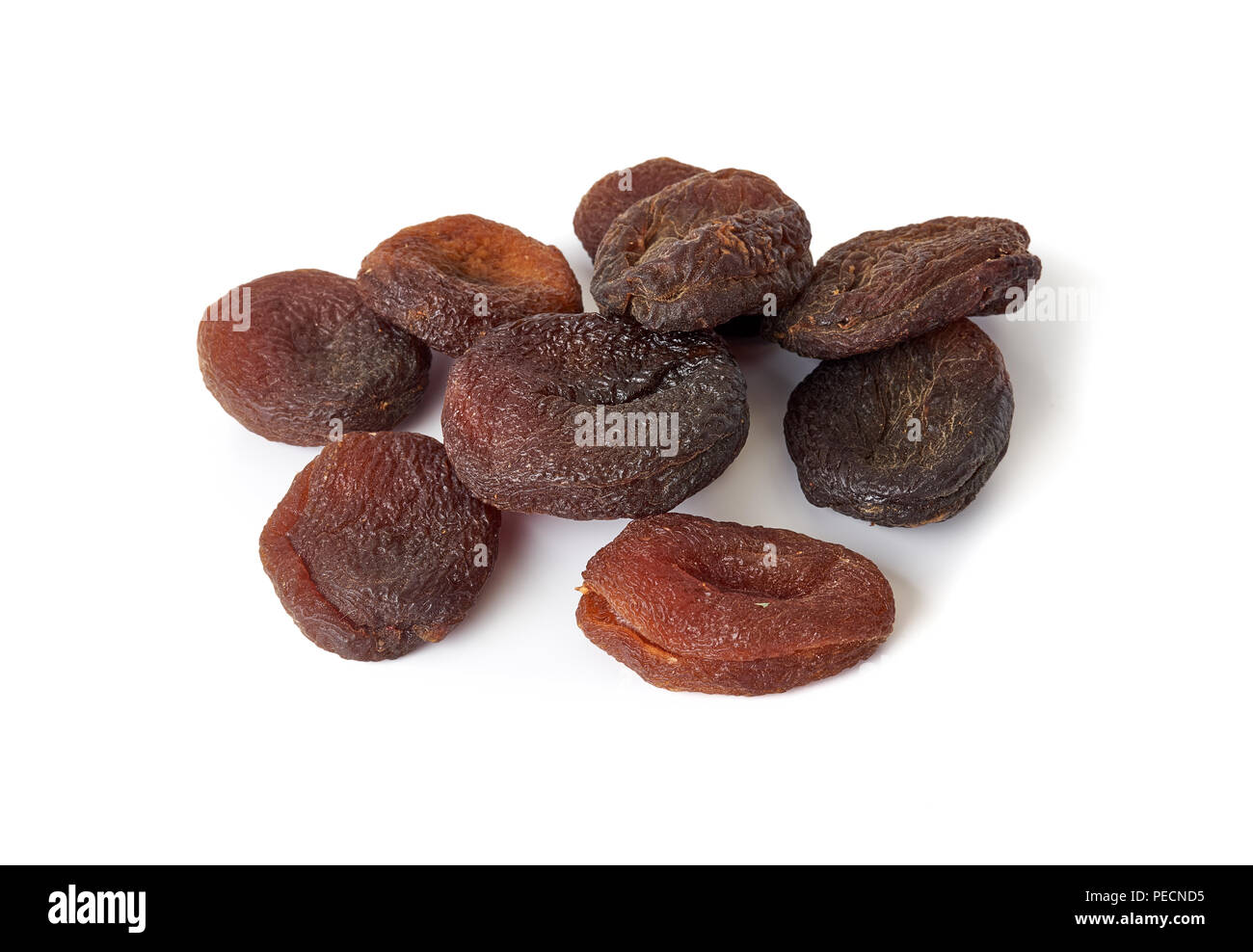 Sun dried apricots isolated on white background Stock Photo - Alamy