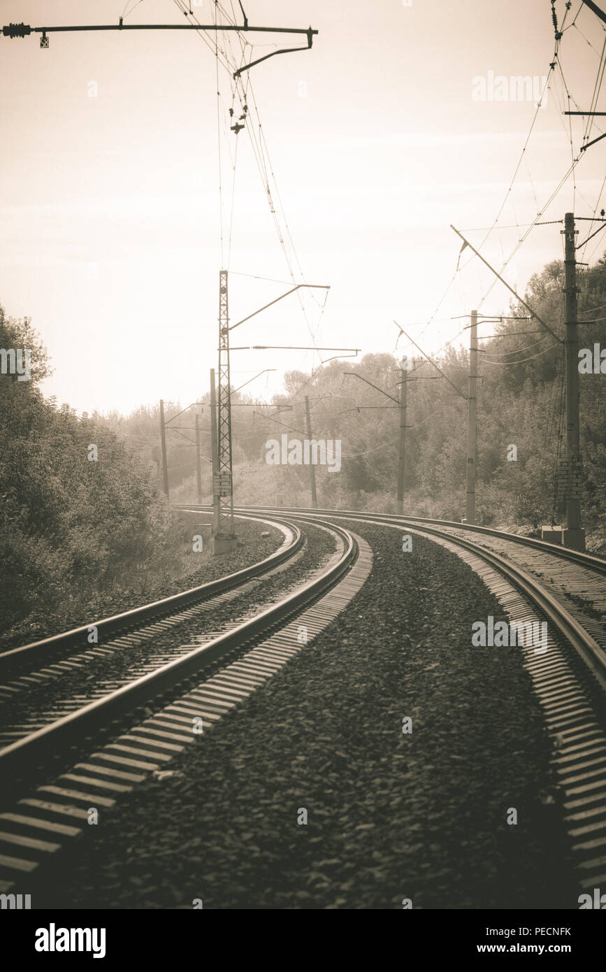 The train railway turns up left in summer landscape. Retro. Vintage ...