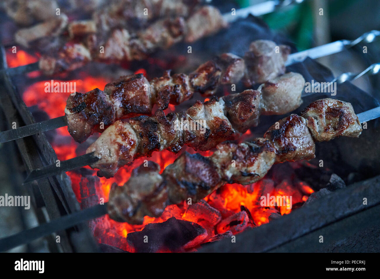 Meat cooking on grill hi-res stock photography and images - Alamy