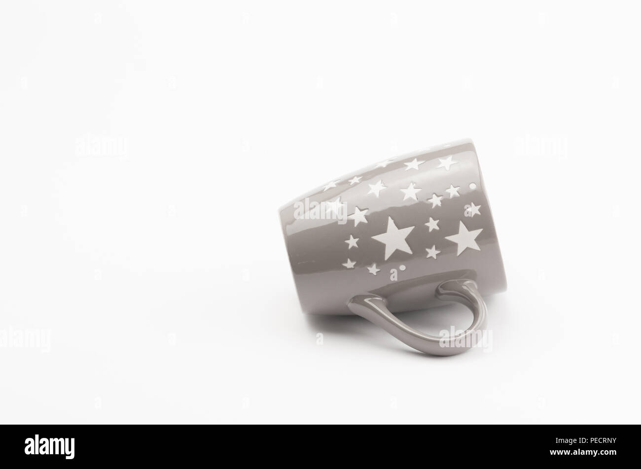 modern stars decorated tea cup Stock Photo - Alamy