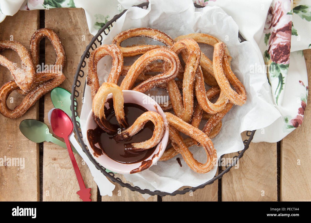 Yummy deep fried churros with cinnamon and sugar Stock Photo - Alamy