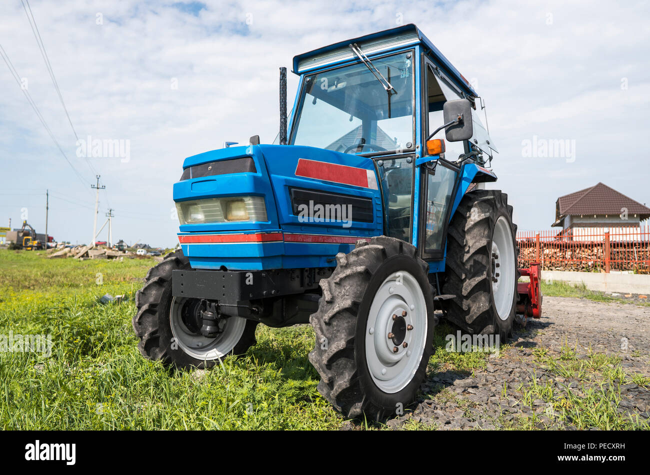 Tractor With Harrow On A Field High Resolution Stock Photography and ...
