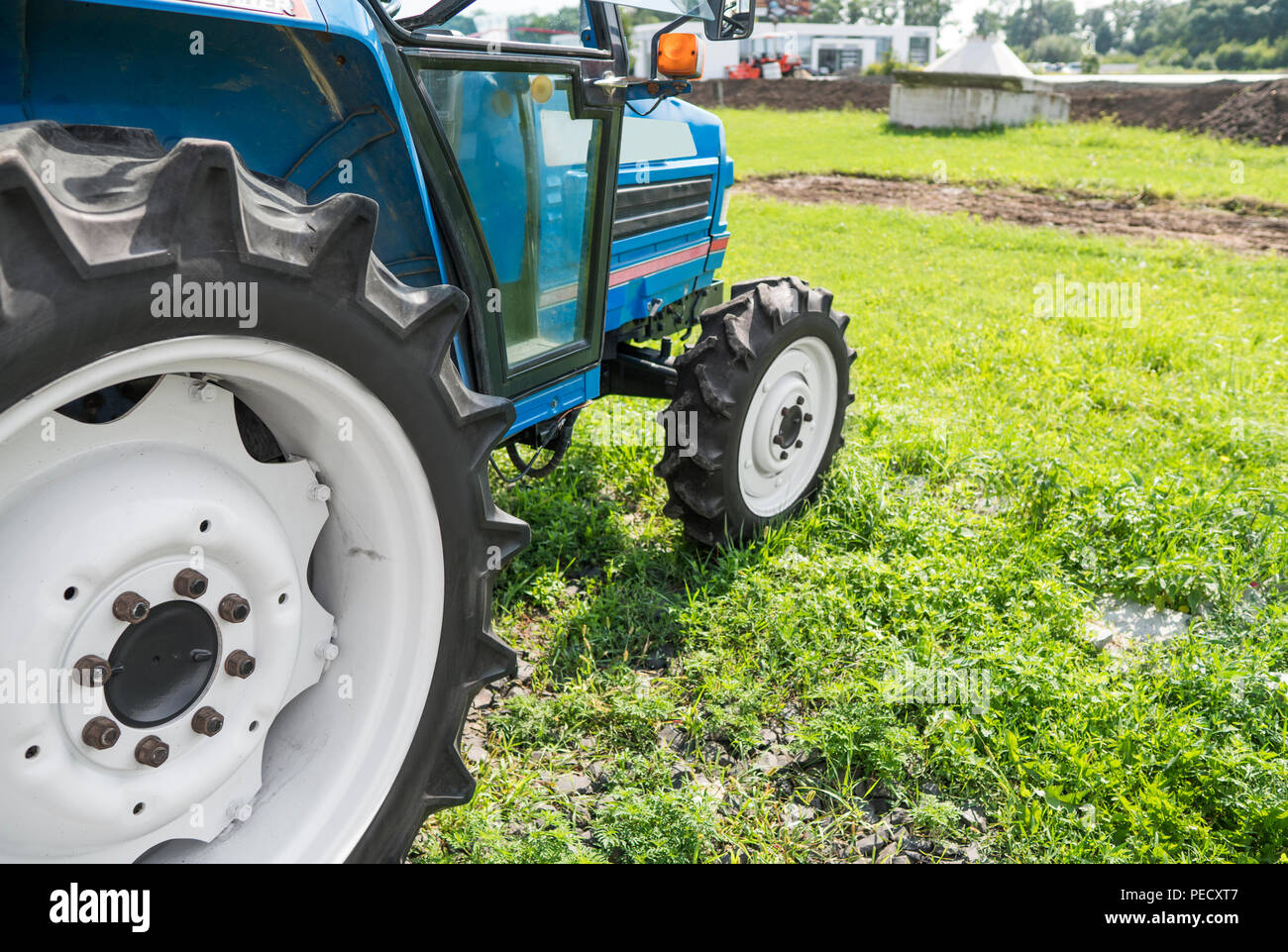 Tractor With Harrow On A Field High Resolution Stock Photography and ...