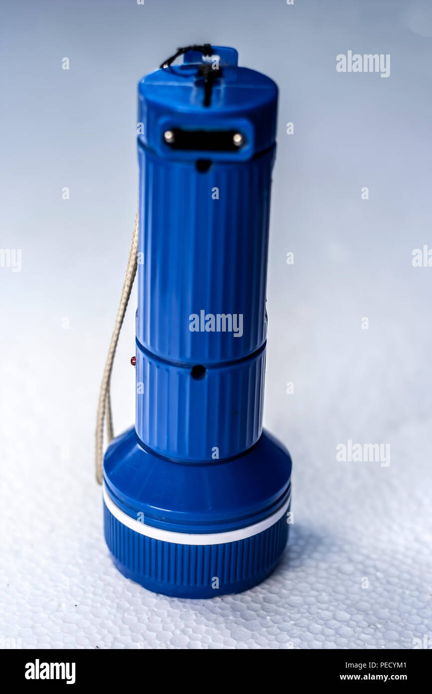 Blue torch isolated on blue and white gradient Stock Photo - Alamy