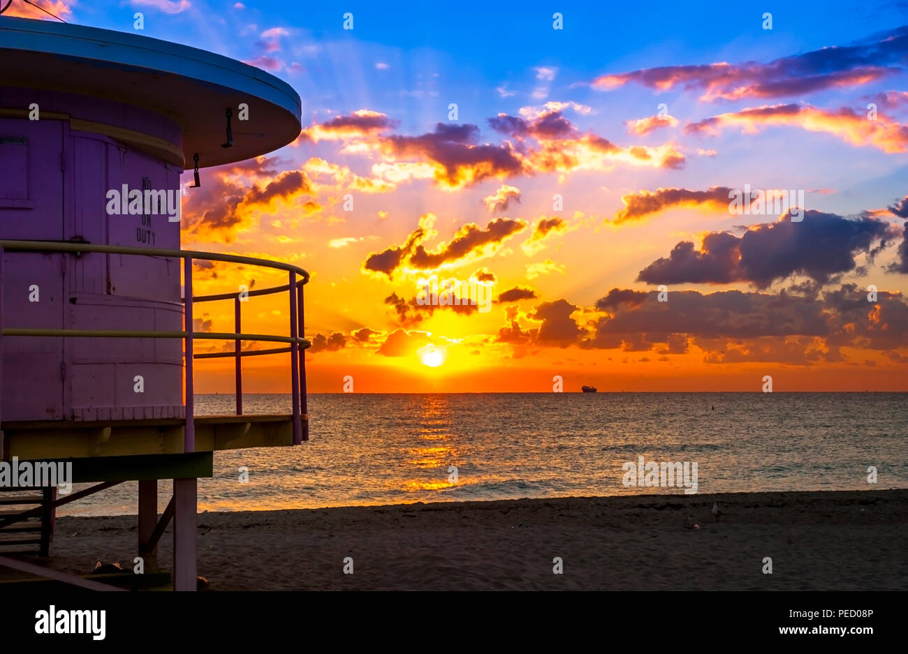 Baywatch sunrise from beach to sun low over the atlantic ocean, Miami ...